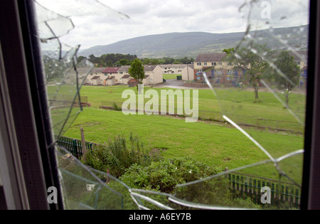 View thru smashed window of empty derelict house on the Gurnos Estate ...