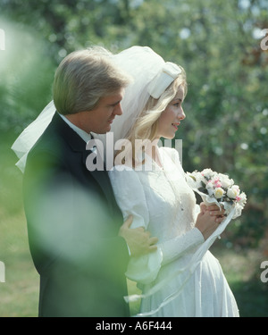 Groom with flowers Stock Photo - Alamy