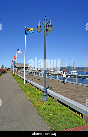 People walking on Boardwalk at Coos Bay Oregon Stock Photo - Alamy