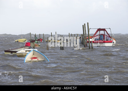 Spring high tide at Morston Harbour showing blakeney point visitors ...