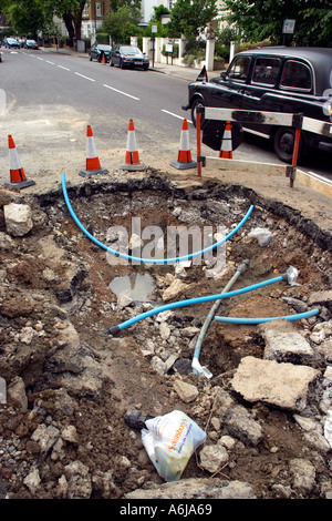 road works repair street crater dig digging pipe pipework roadworks ...