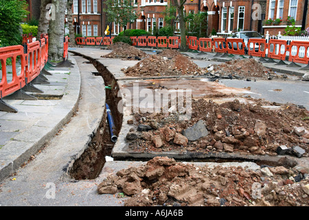 road works repair street crater dig digging pipe pipework roadworks ...