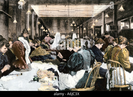 Garment workers in a crowded sweatshop an evasion of factory labor laws ...