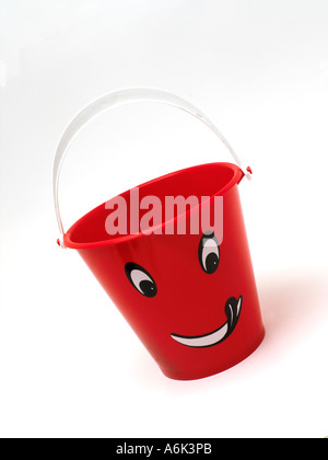 Red Plastic Bucket with Smiley Face Blue Plastic Spade and Yellow ...