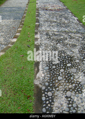 Foot reflexology pebble path Stock Photo - Alamy
