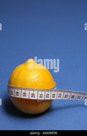 Diet concept. Measuring tape on wooden background with book diary ...