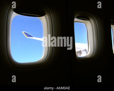 Row of windows in Boeing 747-400 Singapore Airlines Stock Photo - Alamy