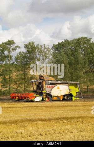 Burn burnt fire combine harvester Stock Photo - Alamy