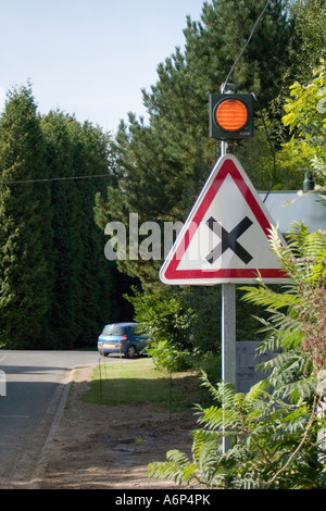 Triangular crossroads road sign on a country road junction Stock Photo ...