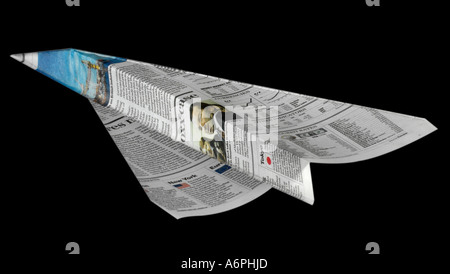 A person throwing a Paper airplane made from newspaper Stock Photo - Alamy