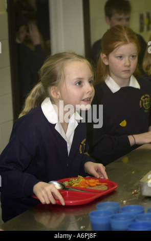 Children queue up for school dinners UK Stock Photo - Alamy