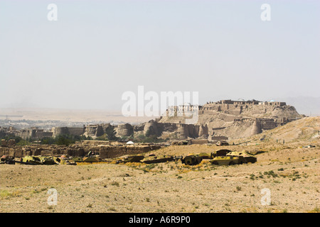 AFGHANISTAN Ghazni Military graveyard with ancient city walls and ...