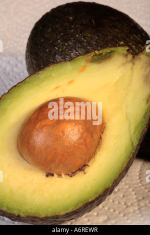 Avacado with stone Stock Photo - Alamy