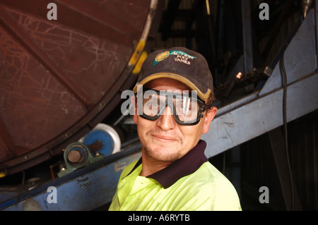 Factory worker wearing high impact safety goggles glasses Stock Photo ...