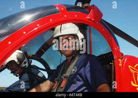 Pilot and Co copilot in small cattle muster chopper Queensland ...