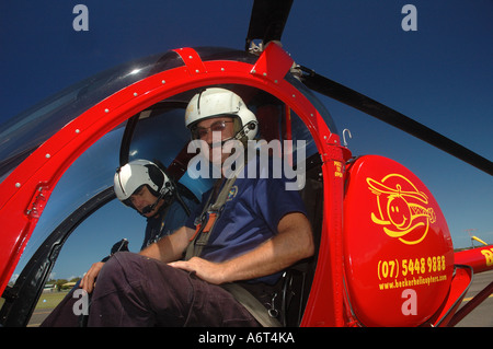 Pilot and Co copilot in small cattle muster chopper Queensland ...