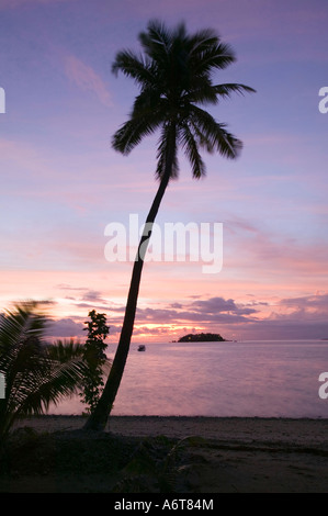 Wadigi island a private island in the Mananucas chain, Fiji at sunset ...
