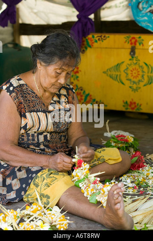 Tuvaluan women creating traditional flower head dresses, Funafuti ...