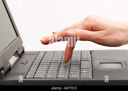 Close-up of a woman typing on mobile phone isolated on white background ...