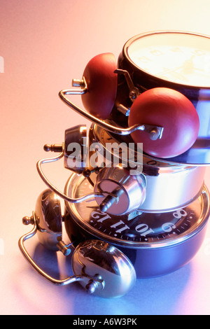 Stack of alarm clocks Stock Photo - Alamy