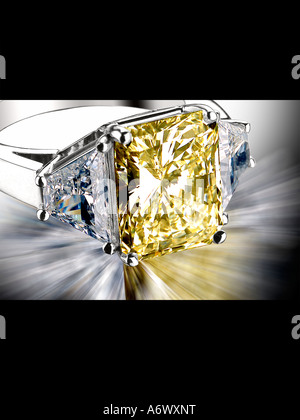 A closeup shot of a gold diamond ring on a stand Stock Photo - Alamy