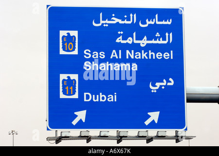 Road signs along Sheikh Zayed road running between Dubai and Abu Dhabi ...