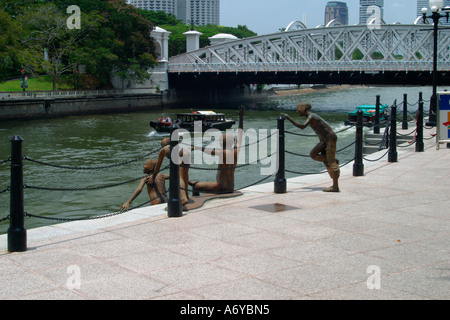 People of the River statue by Chong Fah Cheong of children jumping ...