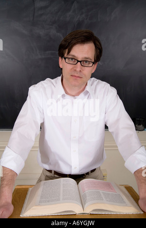 Lecturer standing behind lectern Stock Photo - Alamy