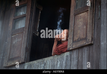 Buddhist monks at window of quarters, Kalaw Monastery, Burma Stock ...