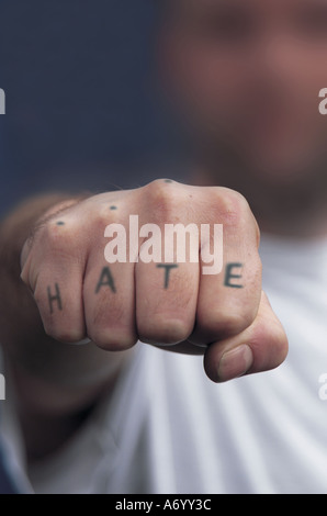 Hate. Hand with clenched fist on dark background. Power, determination ...