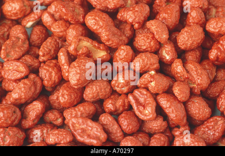 food sweets candied peanuts red Stock Photo - Alamy