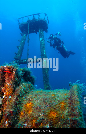 Scuba diver photographer shooting a wreck in the Sea of Cortez Stock ...