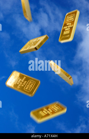Gold bars falling from the sky Stock Photo - Alamy