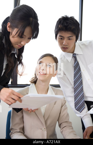 Adult Caucasian man is looking at documents Stock Photo - Alamy