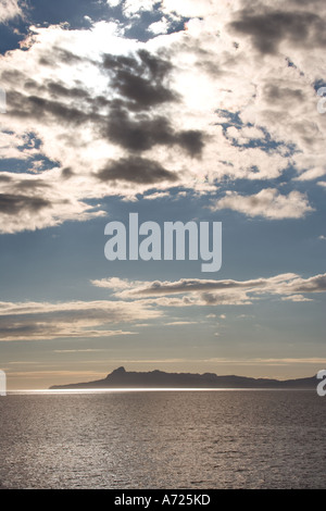The beautiful Isle of Eigg in Summer with Eigg camping pods overlooking ...