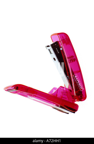 Pink stapler on white background Stock Photo - Alamy