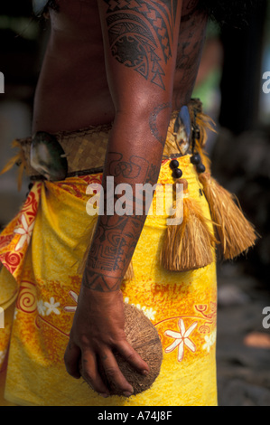 French Polynesia, Moorea. Tiki Polynesian Village. Polynesian young guy ...