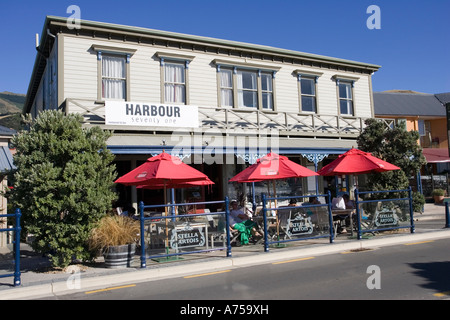Cafes and shops alongside Akaroa harbour Banks Peninsula New Zealand ...