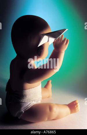 Doll With Paper Plane Stock Photo - Alamy