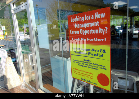Help wanted poster posted in the window of a fast food restaurant Stock ...