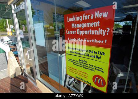 Help wanted poster posted in the window of a fast food restaurant Stock ...