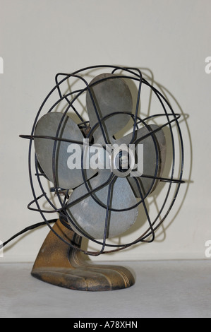 old mid-century metal fan on a wooden farm table, vintage farmhouse fan ...