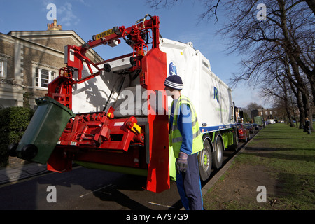 bin lorry / refuse collection. Image shows bin man loading a refuse ...