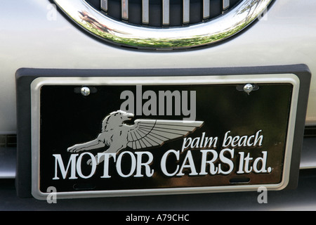 License plate orange white rectangle rectangular blue yellow red curve ...