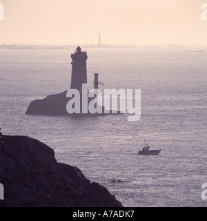 Lighthouse on little island, Pointe du Raz, Brittany, France ...