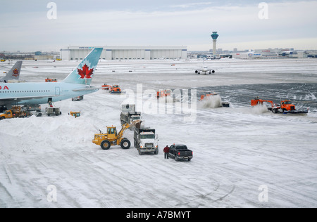 Snow plows clean snow in front of Adler Planetarium in Chicago, Sunday ...