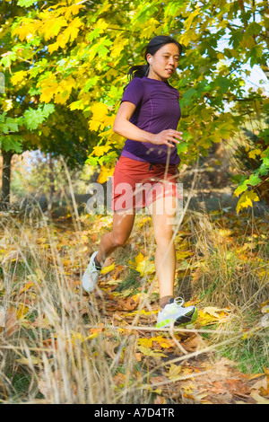 A Fitness Filipina Female Athlete Running Stock Photo - Alamy