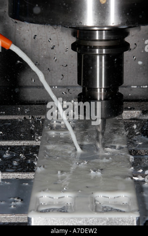 Precision machining in action as a milling machine shapes intricate ...