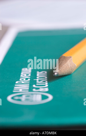 Pencil next to UK Short Tax Return HMRC Her majestys revenue and ...