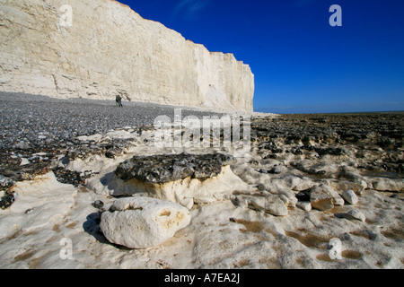 Crumbling chalk cliff and rock face from South West Coast Path between ...